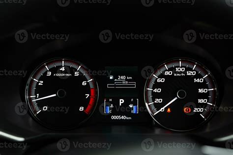 Close Up Modern Mileage Car Dashboard Instrument Panel Interior With