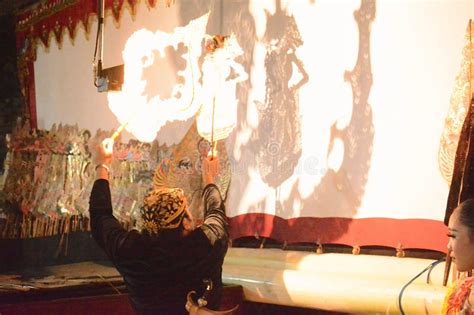 Wayang Kulit Puppet Show With Dalang And Gamelan Musicians In Java
