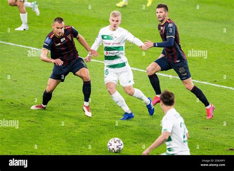 Damian Dabrowski Of Pogon L Tomasz Makowski Of Lechia C And Alexander Gorgon Of Pogon R