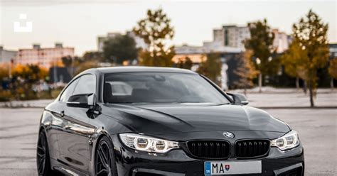 주차된 검은색 Bmw 쿠페 사진 Unsplash의 무료 자동차 이미지