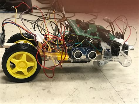 Bluetooth Controlled Obstacle Avoidance Robot Car Using Pic32