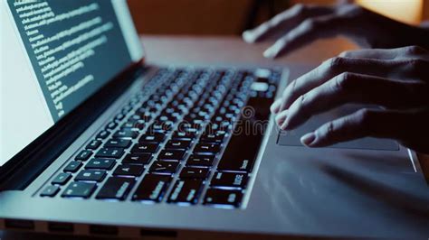 Programmer Writing Code On A Laptop In A Dark Room Stock Footage