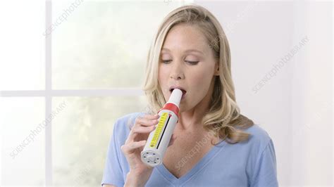 Woman Using Peak Flow Meter Stock Video Clip K007 8810 Science Photo Library
