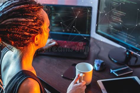 Modern Young Female Programmer Is Writing Program Code On A Laptop At
