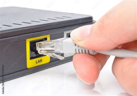 Connect The Cable To The Network Switch Stock Photo Adobe Stock