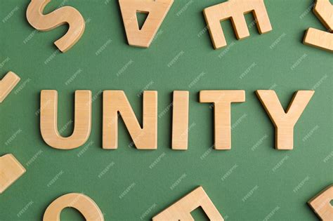 Premium Photo Word Unity Made Of Letters On Color Background