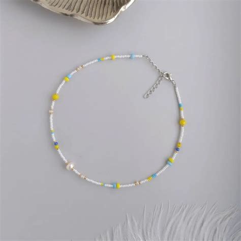 Білий чокер з бісеру і перлинок