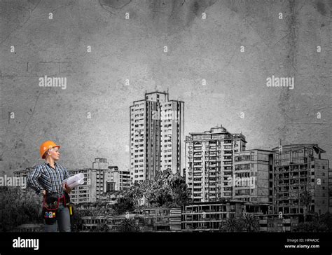 Engineer Woman With Blueprints And Sketches Of Construction Project On Engineer Woman With Blueprints And Sketches Of Construction Project On