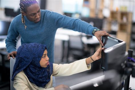 Young Black Muslim Female Software Developer At Work 12720479 Stock