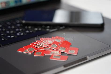 Many Sim Cards On A Laptop Keyboard Bot Farm Stock Image Image Of Number Digital 294498961