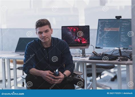 Programming Man Working On Computer In It Office Sitting At Desk