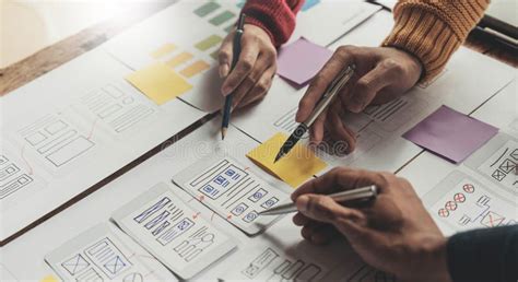 Ui Ux Creative Designer Team Designing Wireframe Layout For Responsive Mobile Smartphone