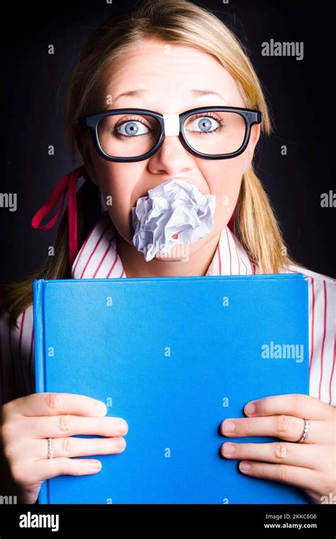 Blue Revision Book Held Tightly In The Hands Of A Terrified And Traumatised Nerd Standing In