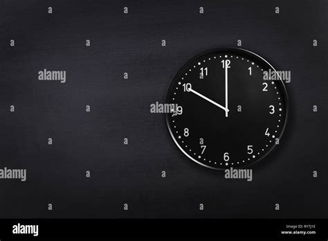 Black Clock Showing Ten Oclock On Black Chalkboard Background Office Clock Showing 10am Or