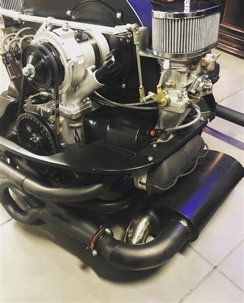 VW Bug Engine In Front Of Blue Wall