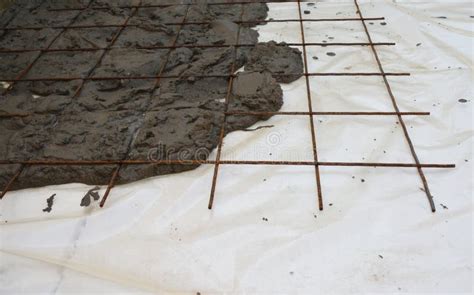 Close Up On Welded Wire Fabric In Concrete Floor Slab Reinforcing Bar Mesh Installed
