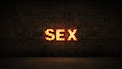 Premium Photo A Lit Up Sign That Says Sex On It