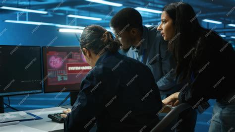 Premium Photo Multiethnic Programmer Team In Server Farm Workspace