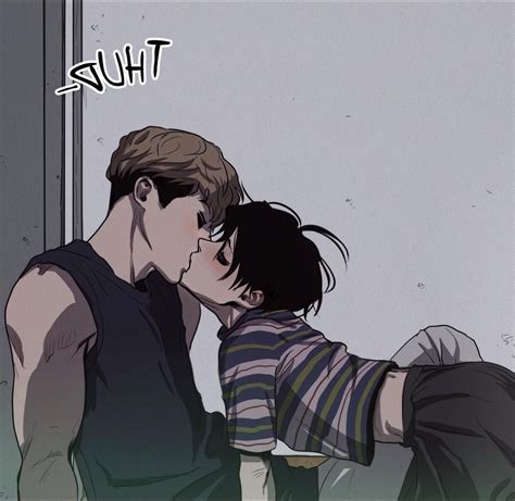 Two People Are Kissing Each Other In Front Of A Wall With The Words