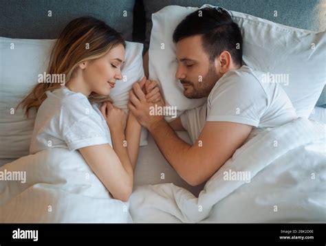 Happy Couple Sleeping In Bed At Homeyoung Cute Couple Sleeping