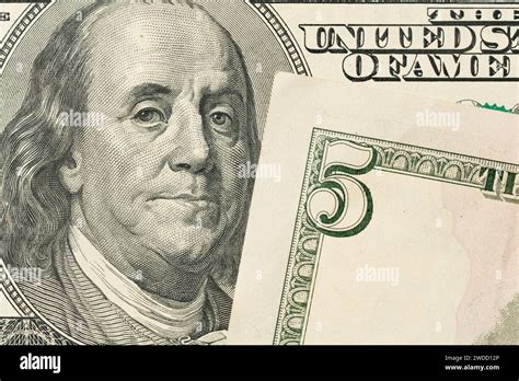 Portrait Of Benjamin Franklin On The One Hundred Dollar Bill And The