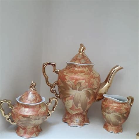 کمدا قیمت و خرید سرویس چای خوری چینی رنگ گلبهی و طلایی سایز ندارد