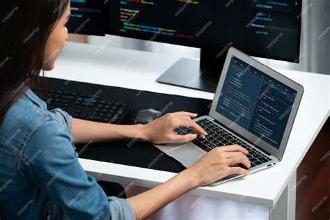 Premium Photo Smiling Asian It Typing Online Software Development On Laptop Stratagem