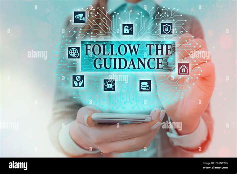 Text Sign Showing Follow The Guidance Business Photo Text Controlling A Course Of Projectile By