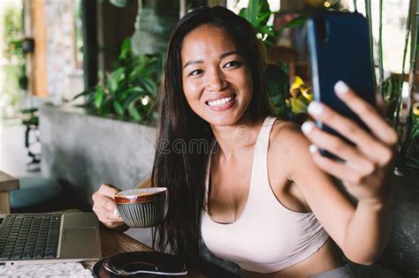 Ethnic Female With Cup Of Coffee Taking Selfie In Cafeteria Stock Image Image Of Cozy Break