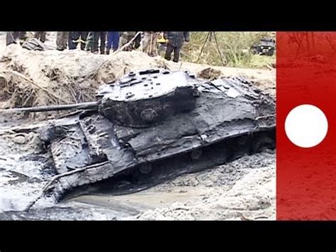 Rare WWII tank emerges from mud in Poland - YouTube