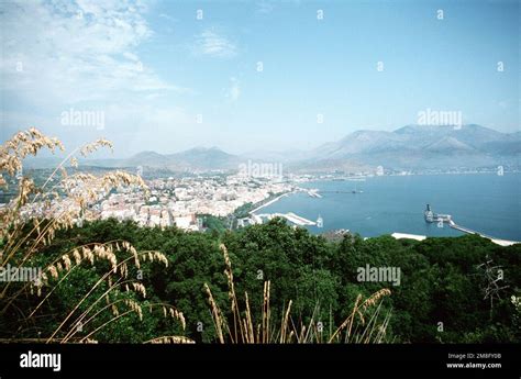 A View Of The City And Its Harbor At Right Is The Guided Missile