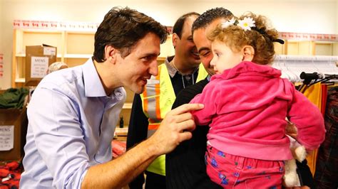 Canadas Pm Justin Trudeau Personally Welcomes First Of 25000 Syrian