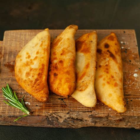 Τυρόπιτες κουρού Συνταγές Μαγειρικής Συνταγές Ζαχαροπλαστικής Μαγειρικής Ελένη Καπνιά