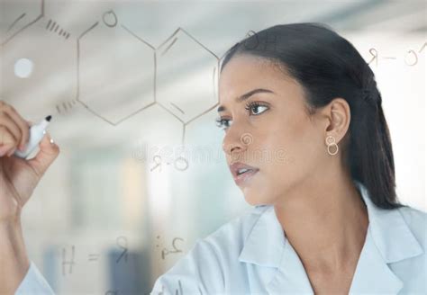 Woman Scientist And Equations On Glass In Lab For Problem Solving