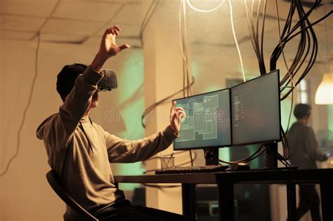 hacker coding in vr helmet hacking server in metaverse stock image