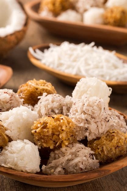 Premium Photo Peruvian Cocadas Traditional Coconut Dessert On Wooden