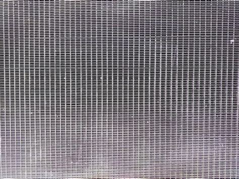 Premium Photo Textured Grid Surface Background With A Soft Filter Effect Creating Depth And