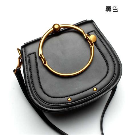 簡約納帕牛皮斜背包 金屬圓環包包 女式馬鞍包 真皮單肩斜挎小包包 牛皮小包包 斜背包 斜挎包 真皮女包 台包網 行動購物手機版 買真皮包包 上台包網 一個專賣真皮包包的購物平台