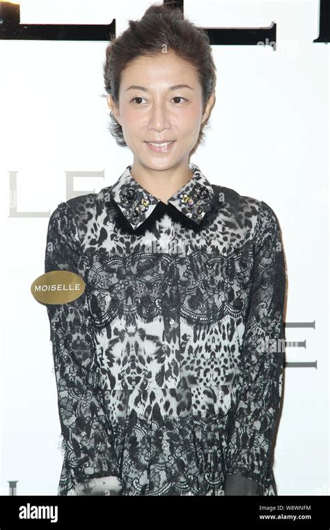 Hong Kong Actress And Hostess Elaine Ng Poses As She Arrives For The Moiselle Fallwinter