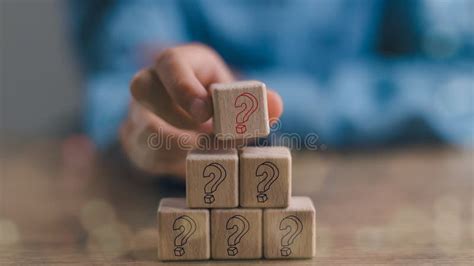 Businesswoman Using Question Marks With Speech Bubblesq And A Online