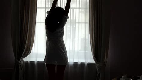 Lady Near Window In Slow Mo Girl Touching Her Hair Wake Up Early Sexuality And Grace Stock