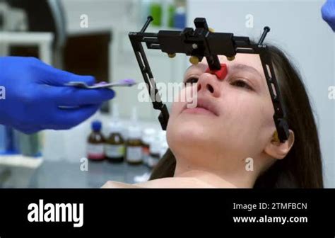 Orthodontist Installs Dental Facebow On Woman Face Prosthetics