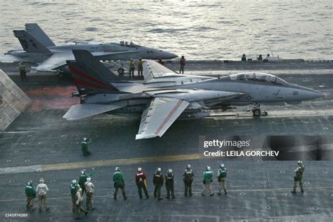 Navy F 14a Tomcat Takes Off From The Uss Kitty Hawk As An F A 18c
