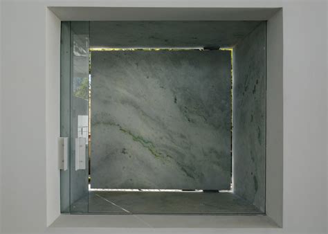 Triptyques Marble Building Is Made To Look Like An Ice Cube