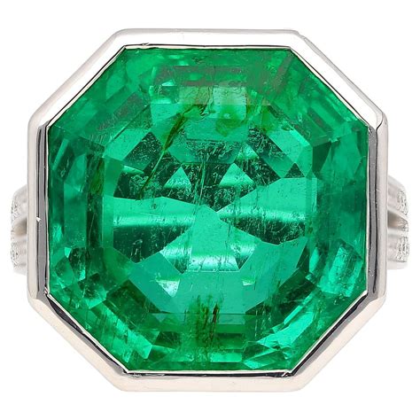 Agl Certified 17 Carat Octagonal Cut Minor Oil Colombian Emerald Bezel