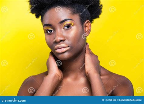 African American Woman With Trendy Makeup Looking At Camera Isolated On