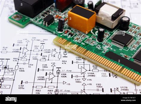 Printed Circuit Board With Electrical Components Lying On Construction