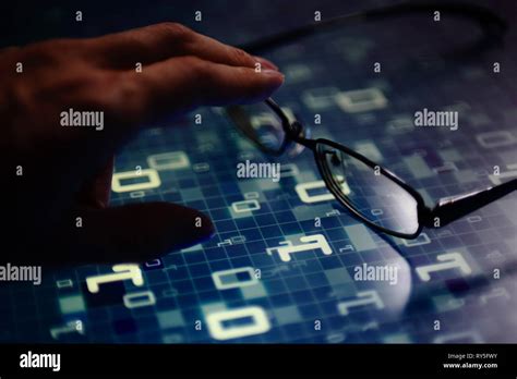 Hand Reaching For Glasses On Digital Led Displaying Multiple Layers Of