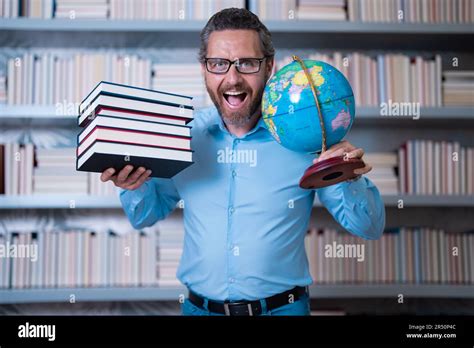 Teachers Day Teacher In School Classroom Knowledge And Education With Middle Aged Teacher