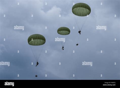 German Army Paratroopers Jump Into Bunker Drop Zone At Grafenwoehr